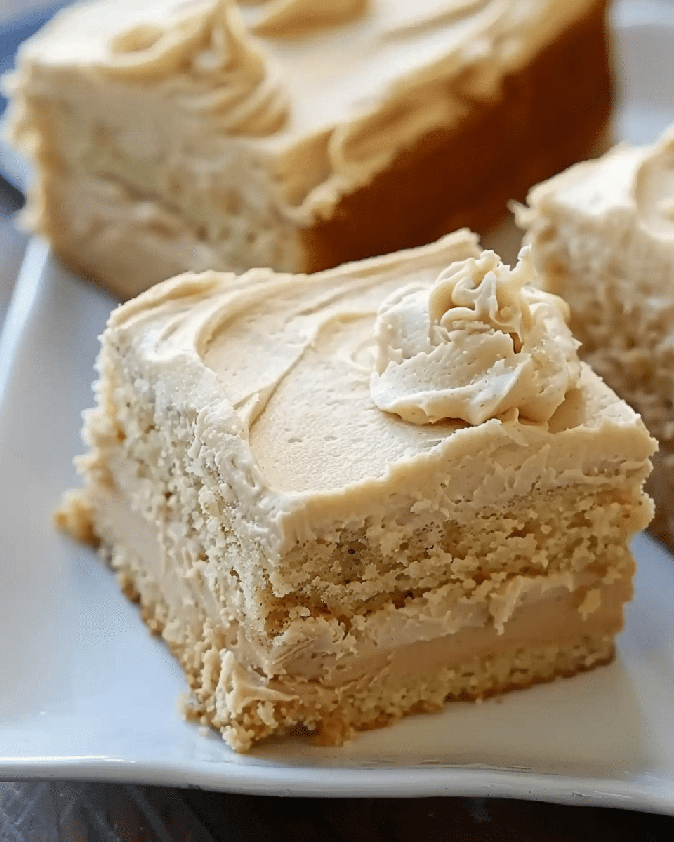 Peanut Butter Sheet Cake with Peanut Butter Frosting | Ella Dishes